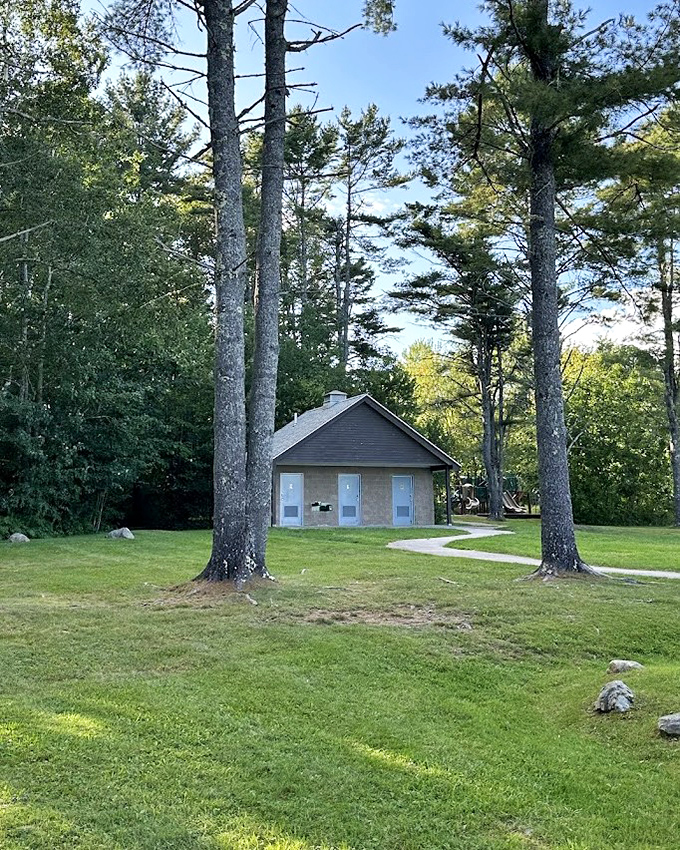 Even the restroom facilities blend into the landscape, proving that practical necessities can coexist with natural beauty harmoniously. 