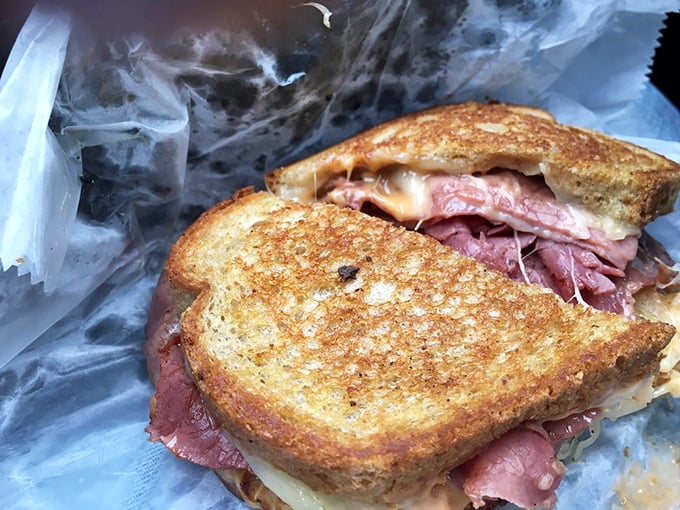 A Reuben sandwich so perfectly grilled it belongs in a museum. That golden toast and pink corned beef create edible art.