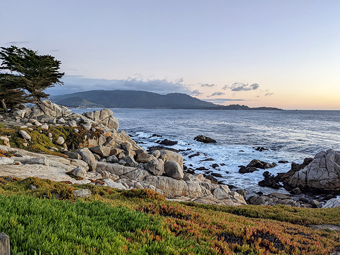 Sunset transforms the coastline into a painter's dream. Those golden-hour hues on granite and water? No filter could improve upon perfection.