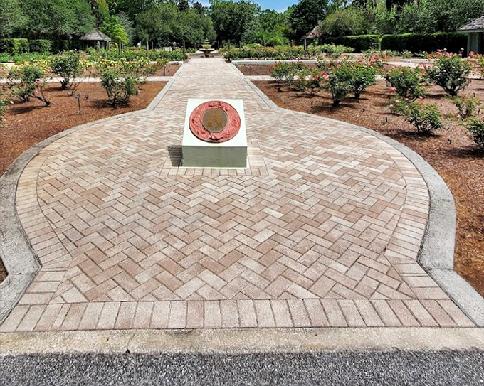 The floral clock marks garden time, where "five minutes" means "however long it takes to smell every rose along the path."