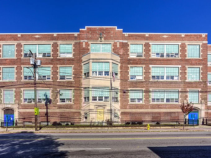 This sturdy brick school building represents Pawtucket's commitment to education&mdash;where generations of students have passed through those blue doors toward their futures.