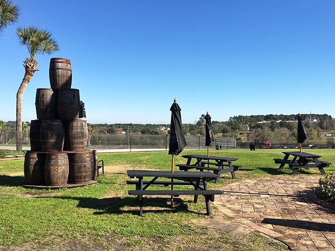 Wooden barrels and picnic tables create the perfect rustic backdrop for contemplating life's important questions, like "Should I have another glass?"
