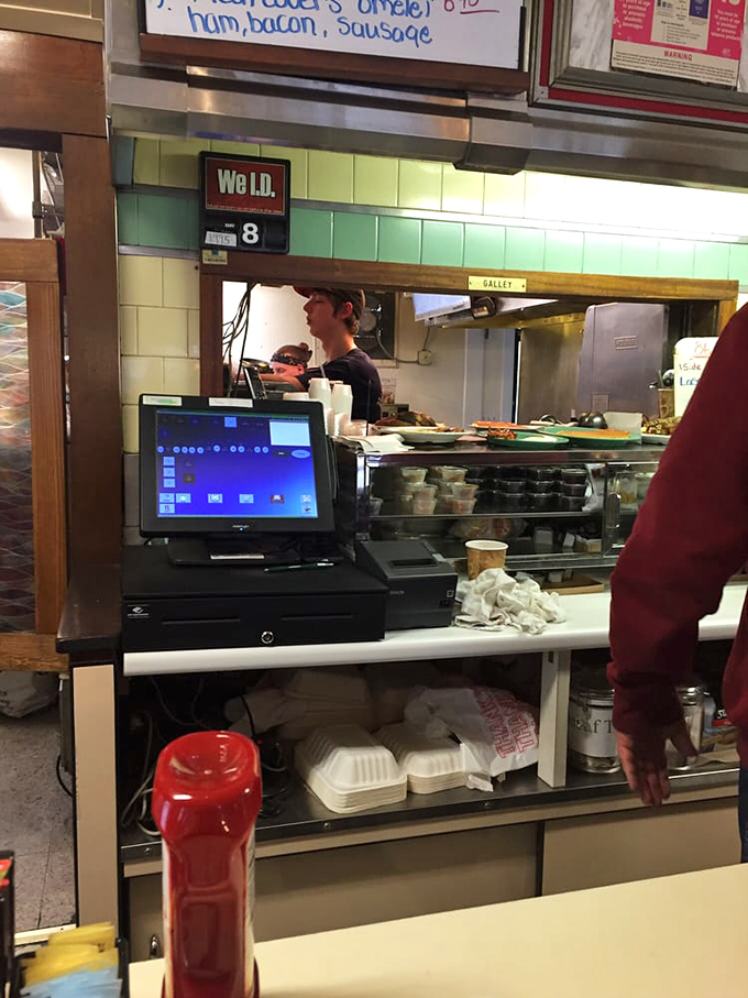 Where orders become art &ndash; the kitchen pass-through offers a glimpse of breakfast choreography in motion.