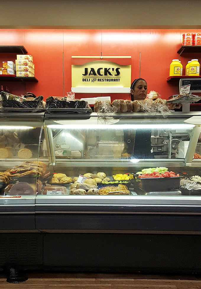 Behind the counter is where the magic happens—fresh salads, classic deli meats, and sides that make you question why you'd eat anywhere else.