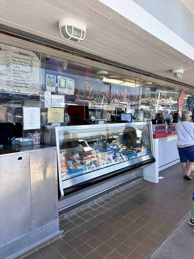 Behind this counter, seafood dreams come true&mdash;where the day's catch transforms into the evening's feast with practiced precision.