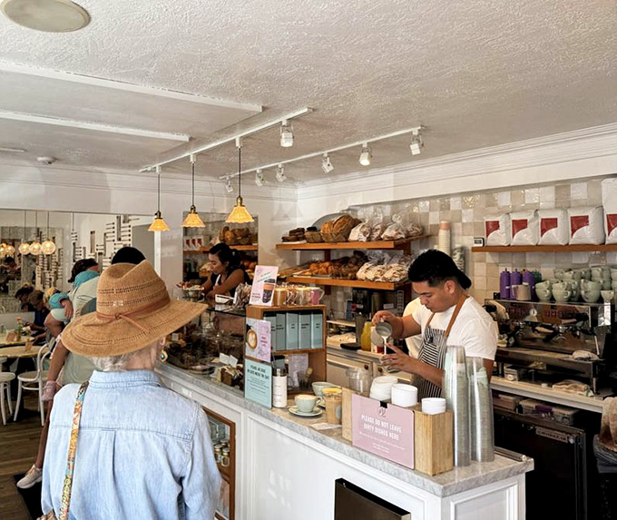 Bread displayed like the works of art they truly are. Each loaf and pastry sits proudly on wooden shelves, daring you to leave without at least one.