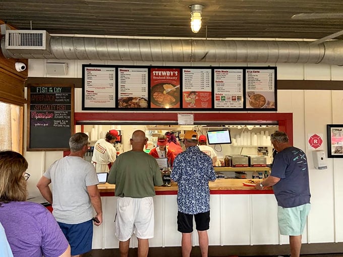 Where the magic happens: locals and tourists alike line up at this counter, united by the universal language of fresh seafood.
