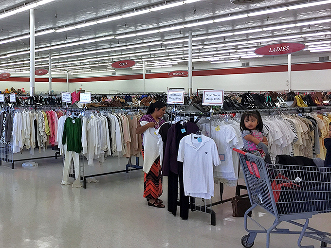 The thrill of the hunt in action&mdash;shoppers carefully considering each potential treasure before it earns a spot in their cart.