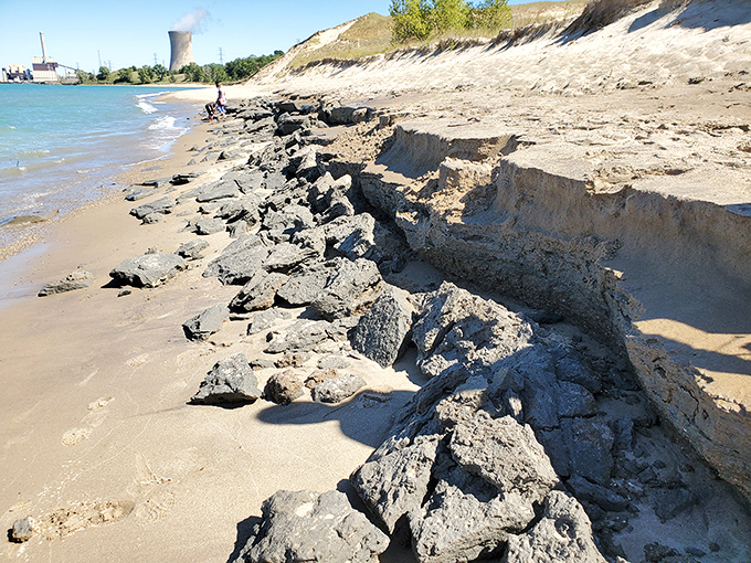 Nature's architecture revealed in layers of sand and clay. The shoreline tells Indiana's geological story one erosion pattern at a time.