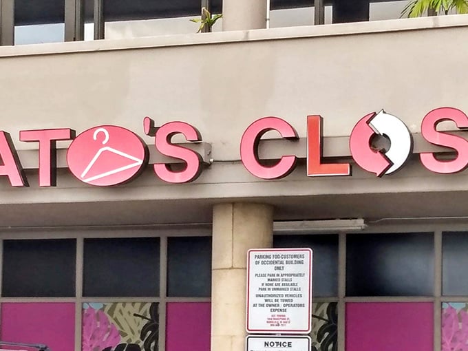 The iconic pink signage beckons like a fashion lighthouse, guiding style-savvy shoppers to safe harbor for their wallets.
