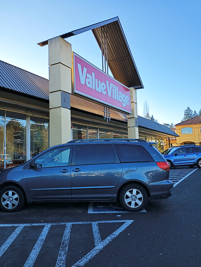 That distinctive Value Village glow. The store's signage shines like a beacon for thrift enthusiasts as the Pacific Northwest sky does its moody thing.