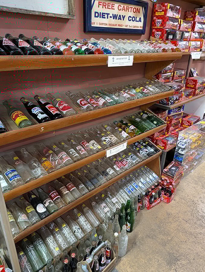 Rows of glass bottles showcase forgotten soda brands, reminding us that Diet-Way Cola deserved better than historical obscurity.