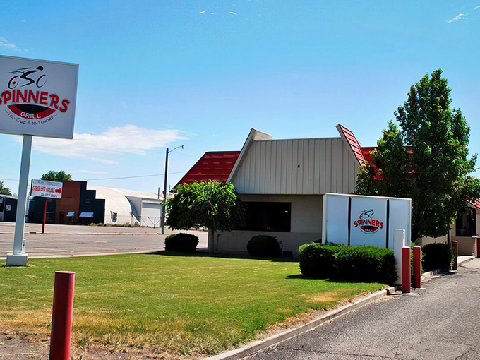Spinners Restaurant sits ready to welcome hungry travelers, its unassuming exterior hiding what locals know is a reliable spot for comfort food.