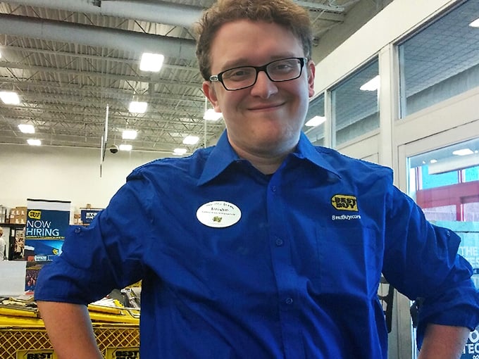 The image appears to show a retail environment, possibly with store personnel. The bright lighting highlights the organized retail space.