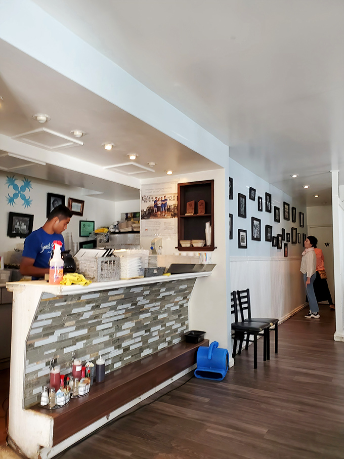 The counter where breakfast dreams come true, staffed by friendly faces who've seen the "first bite face" a thousand times and still smile every time.