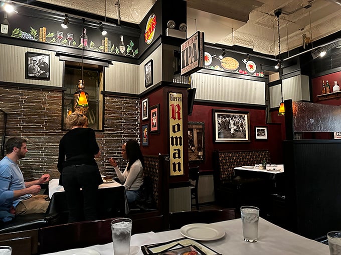 The warm wood paneling and vintage d&eacute;cor create dining nooks where conversations flow as freely as the house Chianti.