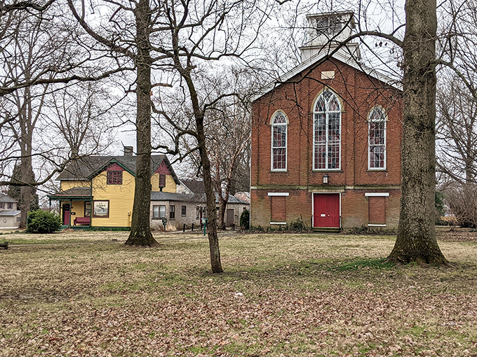The Switzerland County Museum and neighboring yellow house create a historical odd couple that somehow works perfectly together.