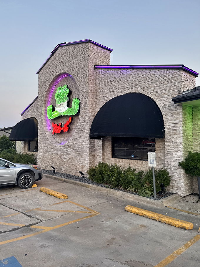 Two Frogs Grill glows with neon promise, the kind of place where comfort food meets night out, and nobody rushes you through dessert.