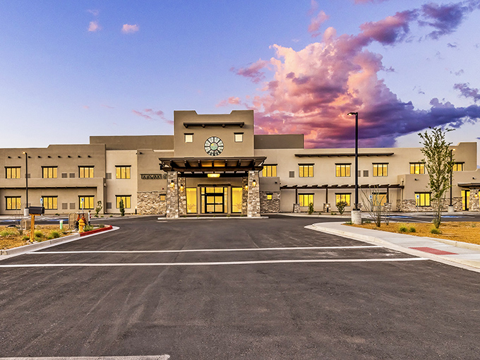 The Taawaki Inn glows at sunset, its modern Southwest design blending perfectly with the landscape. Desert luxury without the desert price tag.