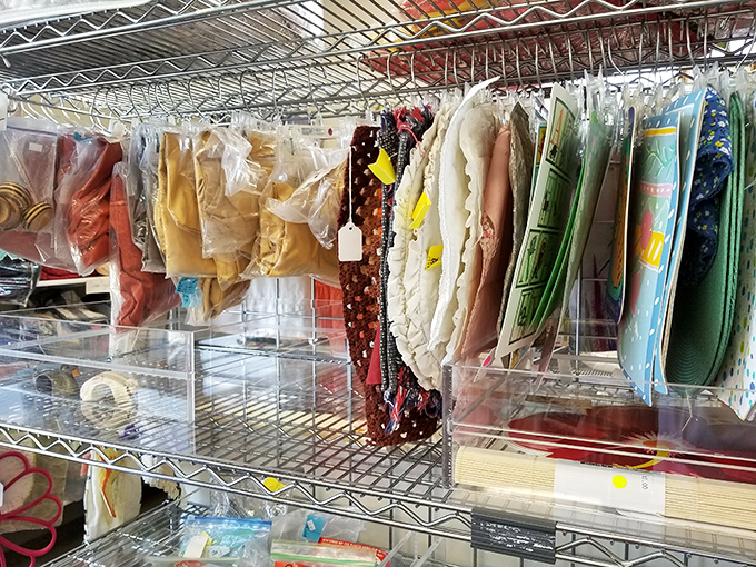 Crafting paradise! Neatly organized fabric, placemats, and sewing supplies await creative minds looking to transform secondhand treasures into personalized masterpieces.