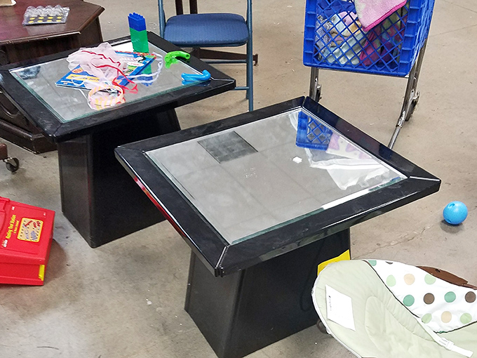 Modern coffee tables awaiting their second chance at stylish service. One person's discard becomes another's living room centerpiece.