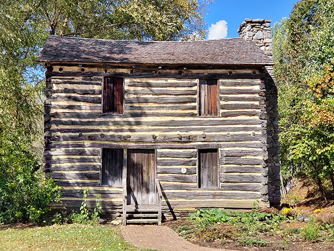 This preserved log cabin stands as a testament to pioneer spirit. If these walls could talk, they'd tell tales of determination that built Tennessee.