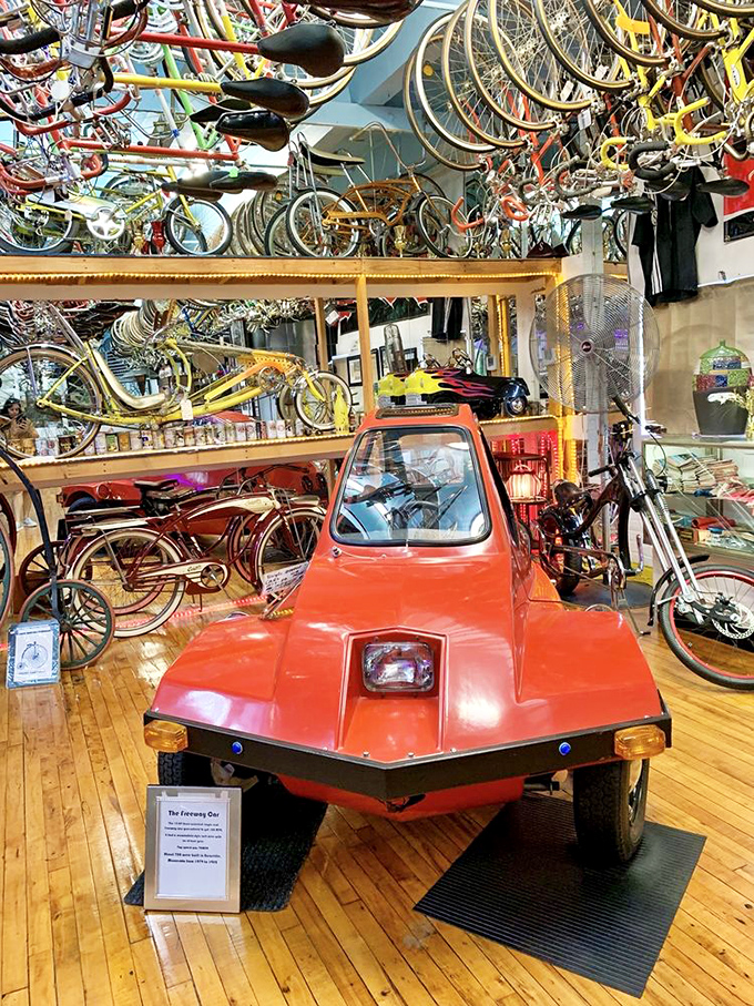 This quirky red Freeway Car proves that even in a bicycle museum, sometimes you need four wheels to truly stand out from the crowd.