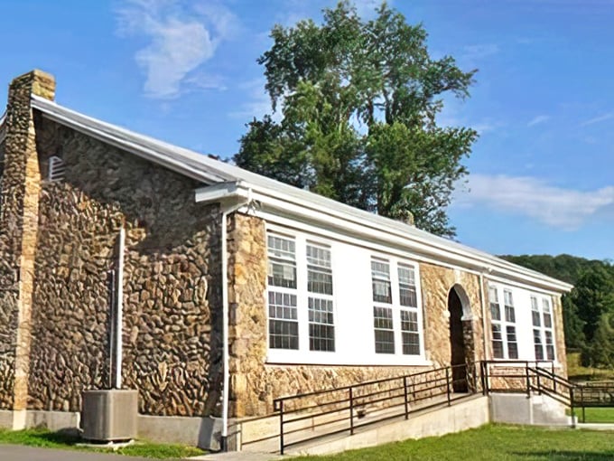 Stone walls and sturdy construction &ndash; this community building has weathered decades of mountain seasons while maintaining its dignified Appalachian charm.