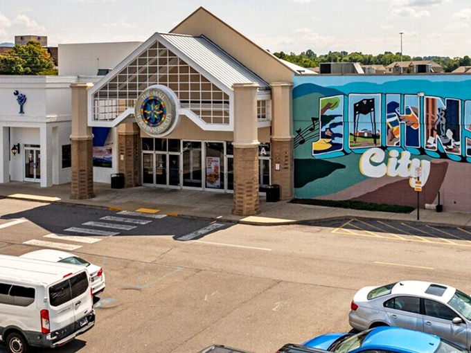 The Mall at Johnson City welcomes shoppers with architectural flair and a colorful mural that captures the spirit of this mountain community.
