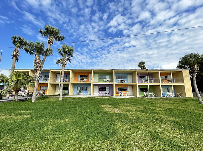 The Port Hotel's colorful facade mirrors Crystal River's playful spirit, offering accommodations as cheerful as the Florida sunshine.