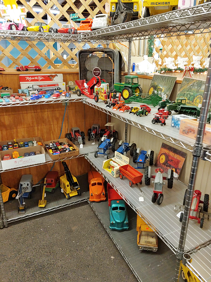 Miniature tractors and vintage toy cars await collectors young and old. Each tiny vehicle carries outsized nostalgia.