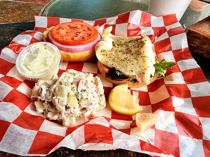 The triggerfish sandwich with potato salad might look humble, but one bite and you'll understand why locals keep this place packed.