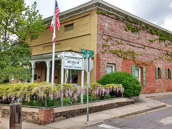 History isn't just preserved behind glass here&mdash;it blooms alongside the building at the Tuolumne County Museum's welcoming entrance.