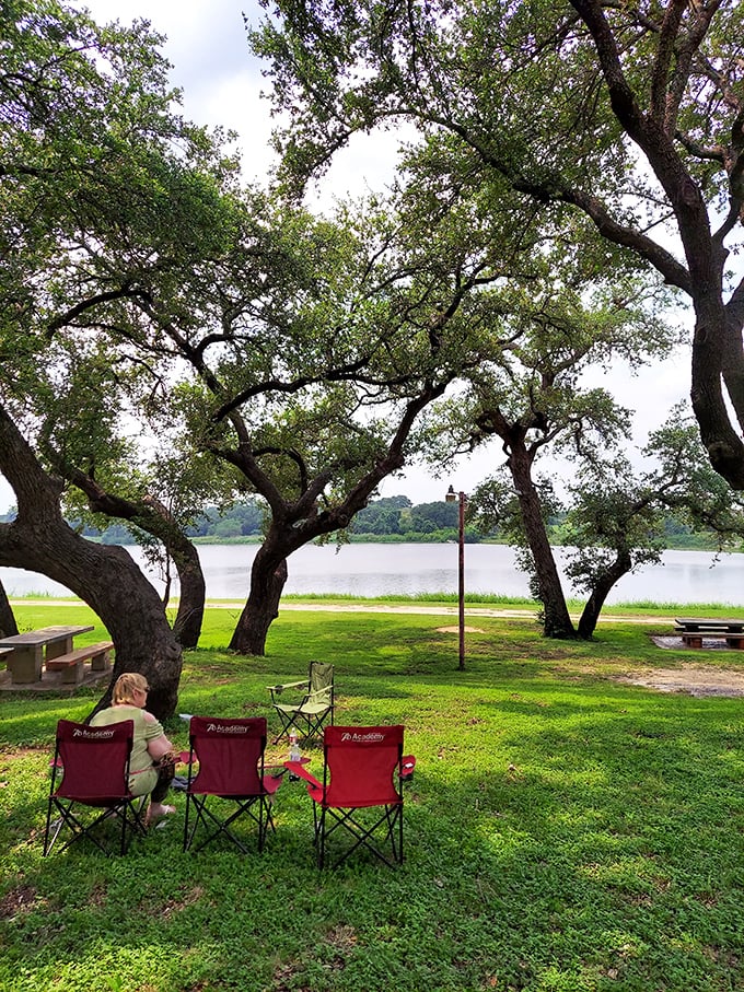 Three empty chairs facing the river &ndash; an invitation to slow down and remember when entertainment didn't require a charging cable.