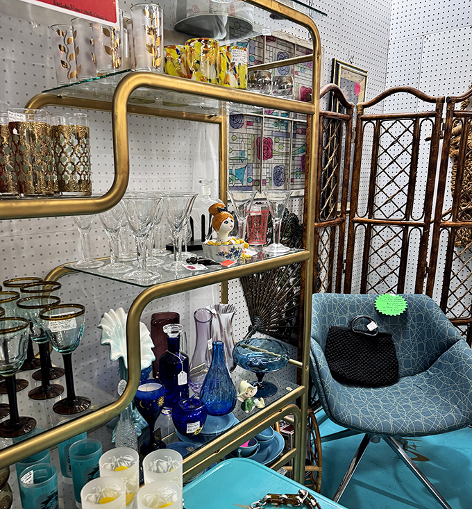 Mid-century glassware and brass shelving&mdash;the ingredients for instant sophistication in any modern home.