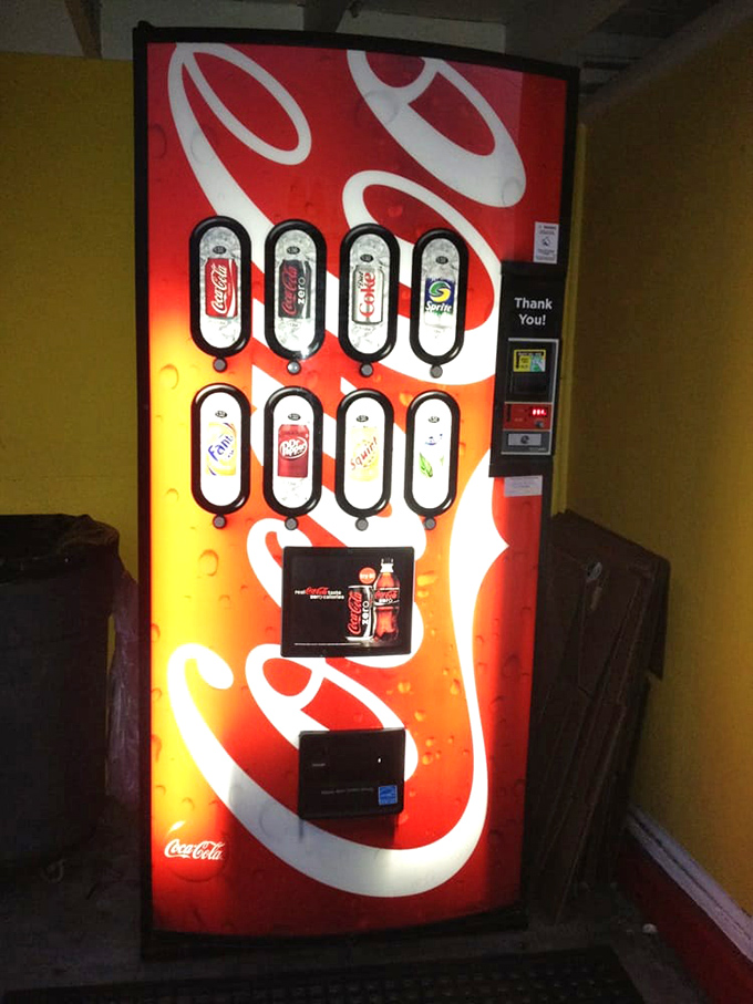 The glow of the Coca-Cola machine stands ready to quench thirsts during those edge-of-your-seat thriller moments.