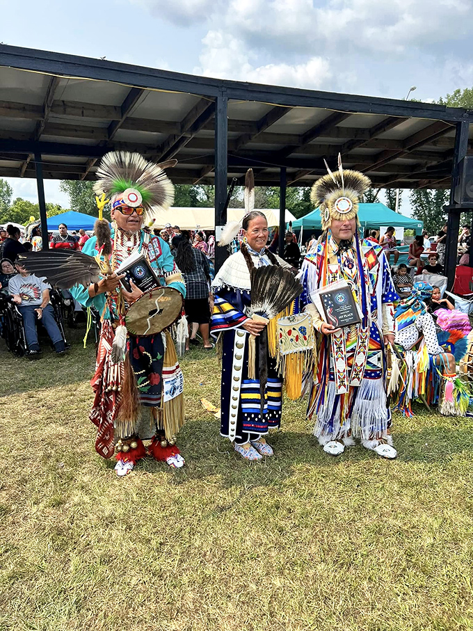 Traditional regalia and modern awards showcase the vibrant cultural heritage of the Flandreau Santee Sioux Tribe's continuing presence.