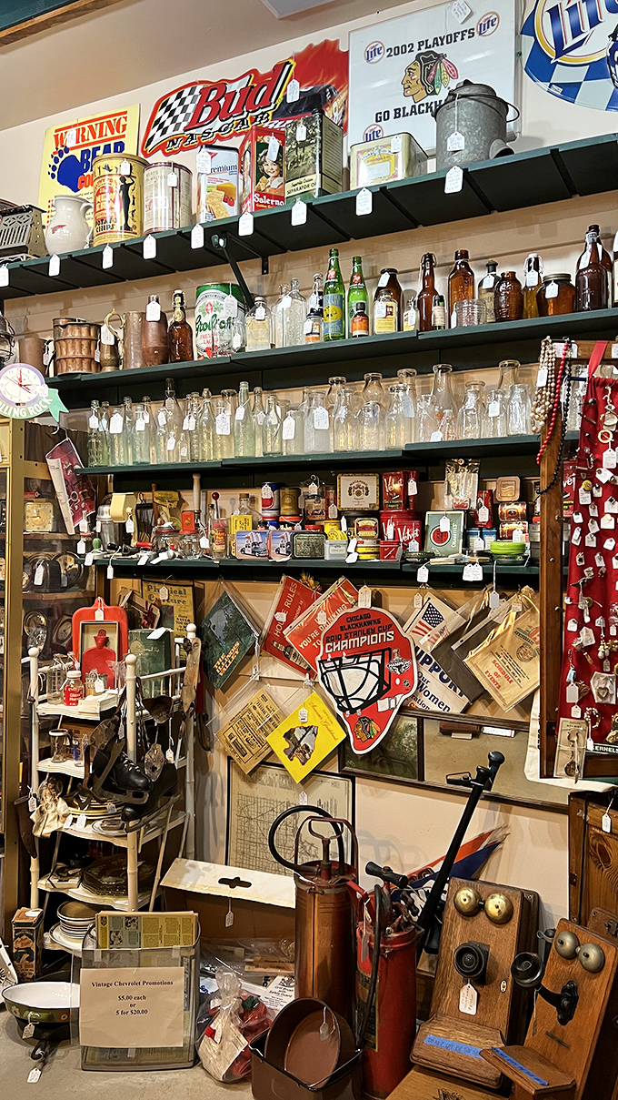 Chicago sports memorabilia meets vintage bottles in a display that screams "man cave goals" to husbands and "absolutely not" to their wives.
