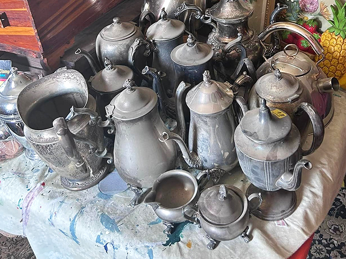 Vintage silver teapots and kettles gathered together like a fancy Victorian ladies' convention you can actually afford.