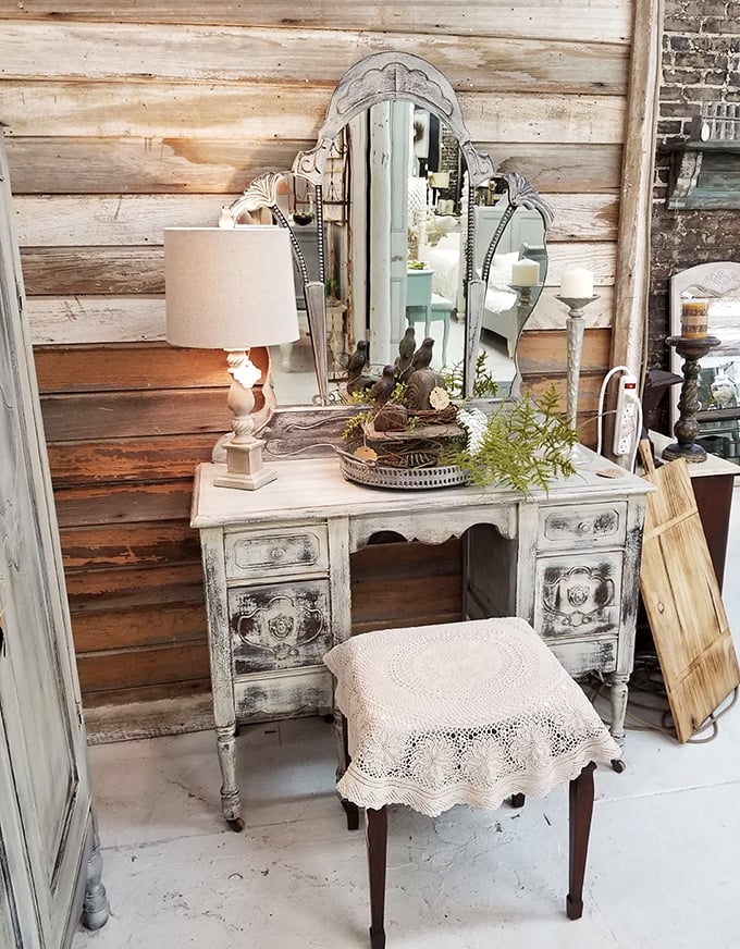 This shabby-chic vanity isn't just furniture &ndash; it's a time portal where your grandmother might have applied her signature red lipstick.