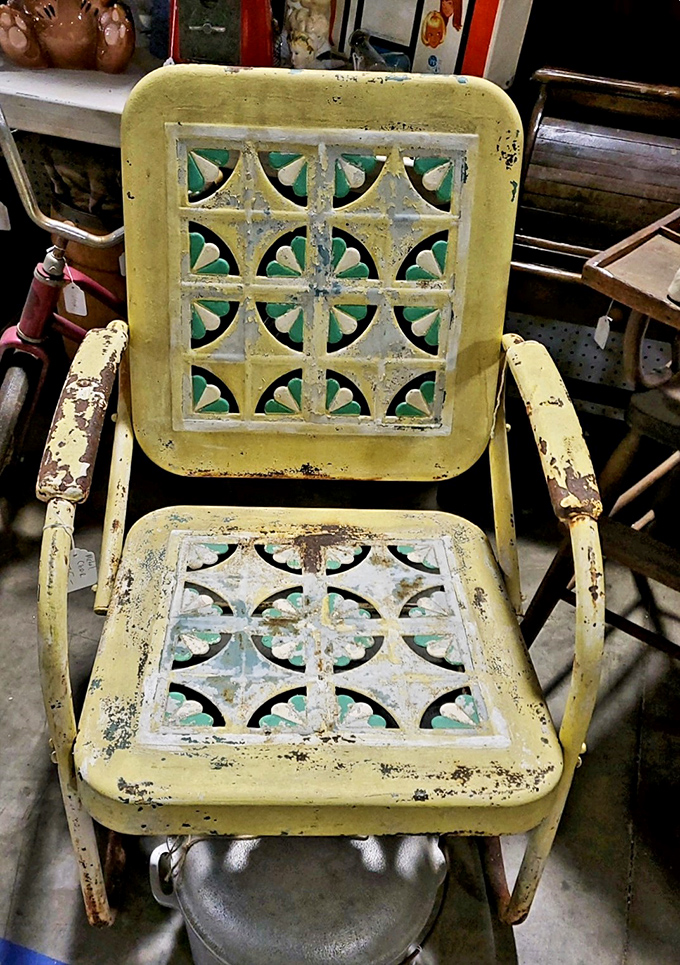 This vintage metal lawn chair has weathered decades of backyard barbecues and still looks ready for another summer of lemonade sipping.