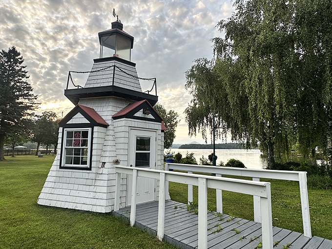 This charming lighthouse replica stands guard over Lake Memphremagog like a miniature sentinel. Whimsy meets function in perfect New England style.