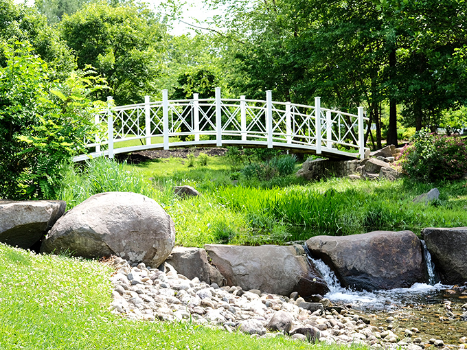 This pristine white bridge seems plucked from a wedding cake topper, spanning a stream that's been flowing since before Instagram existed.