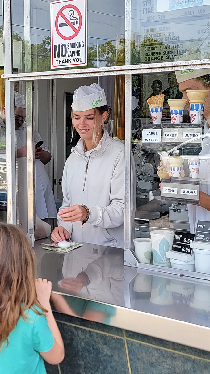 The service window at Carl's&mdash;where dreams are dispensed with a smile. Childhood excitement knows no age limit when custard's involved.