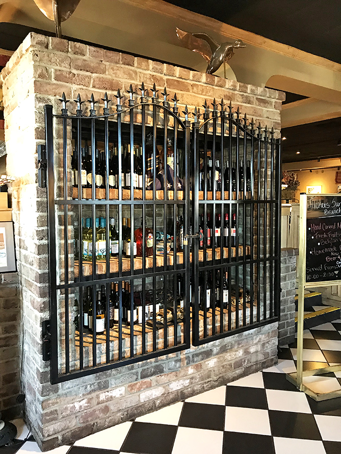 The wine cellar behind ornate ironwork isn't just storage&mdash;it's a treasure chest of bottles waiting for their moment to shine.