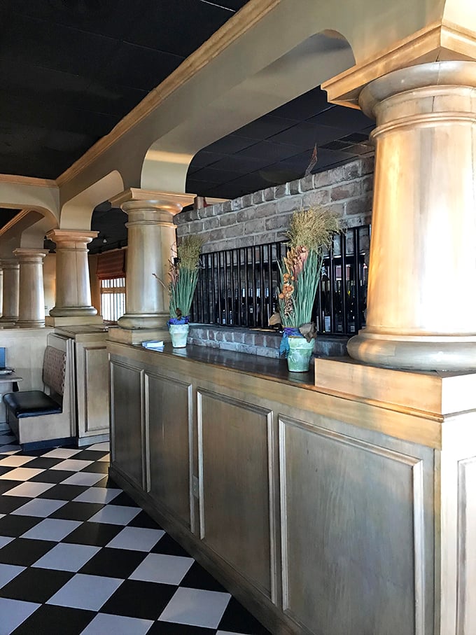 Behind these ornate bars lies liquid treasure—a wine collection that promises the perfect companion to your perfectly cooked steak.