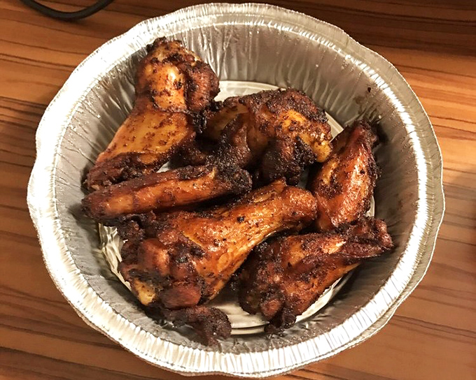 Wings that have been introduced to smoke before heat. These aren't your standard sports bar fare&mdash;they've been elevated through the magical transformation of low and slow cooking.