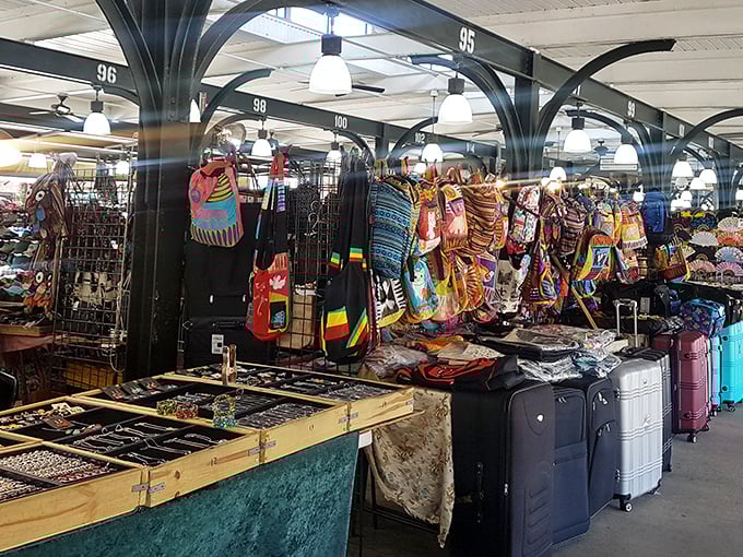 The market's numbered stalls create a treasure map of possibilities, with colorful bags hanging like exotic fruit ready to be picked.