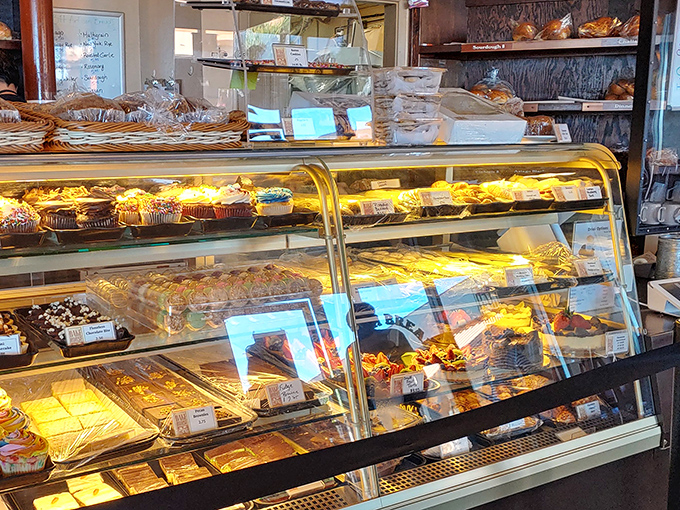 A treasure chest of baked delights awaits behind glass. Each golden-hued pastry practically whispers your name as you approach the counter.