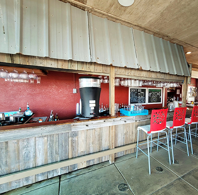 The bar area combines rustic wood, red walls, and Florida sunshine&mdash;a trifecta that practically guarantees good times ahead.